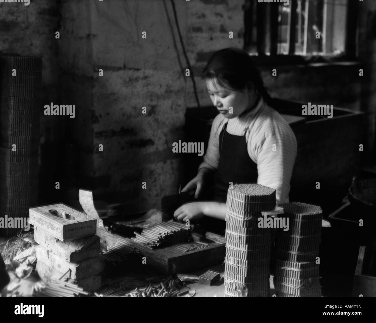 1920s 1930s CHINESE GIRL CUTTING PAPER TUBES FIRECRACKER FACTORY WORK ...