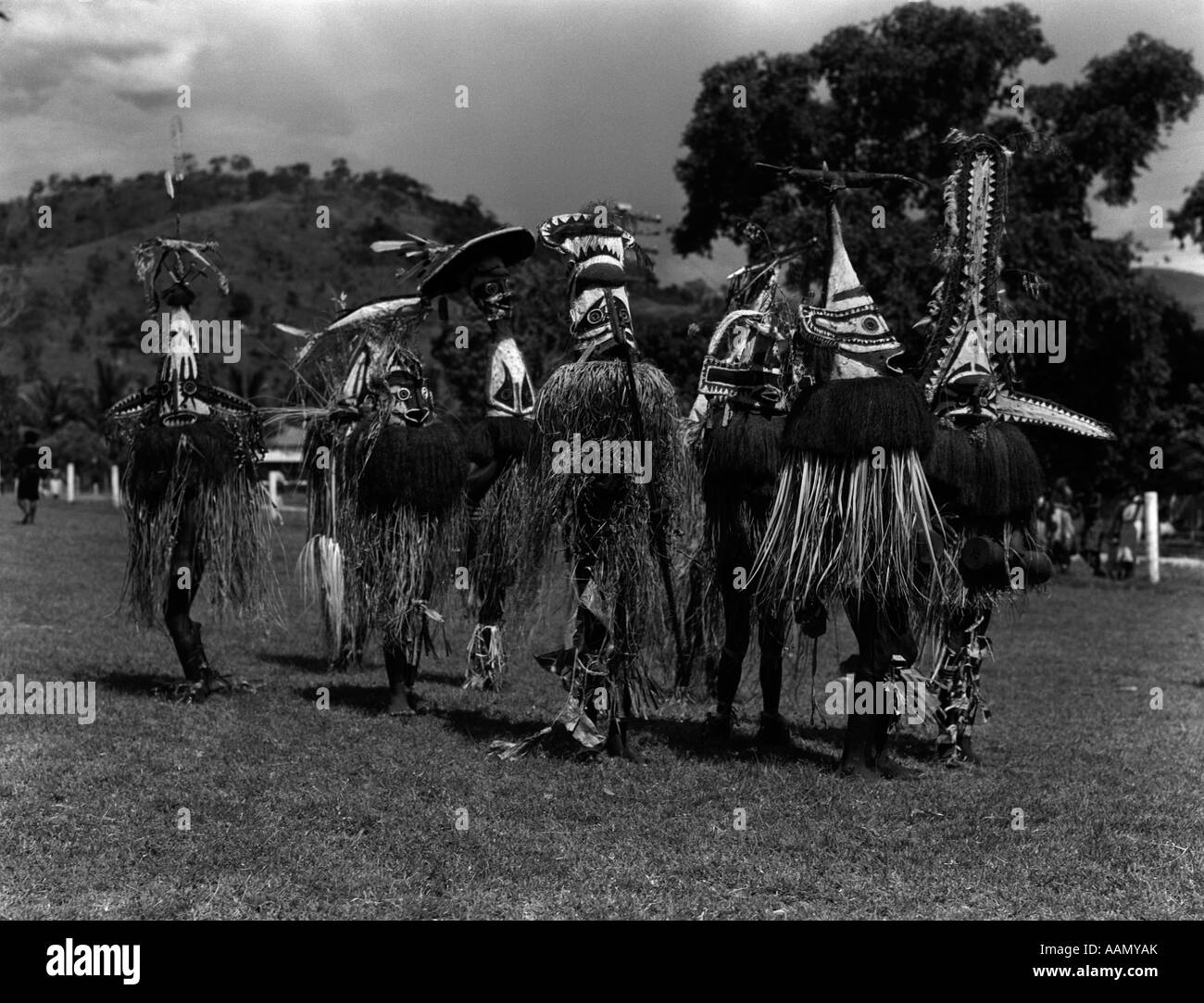 1920s 1930s GROUP OF NATIVES IN ELABORATE STRAW CEREMONIAL COSTUMES ...