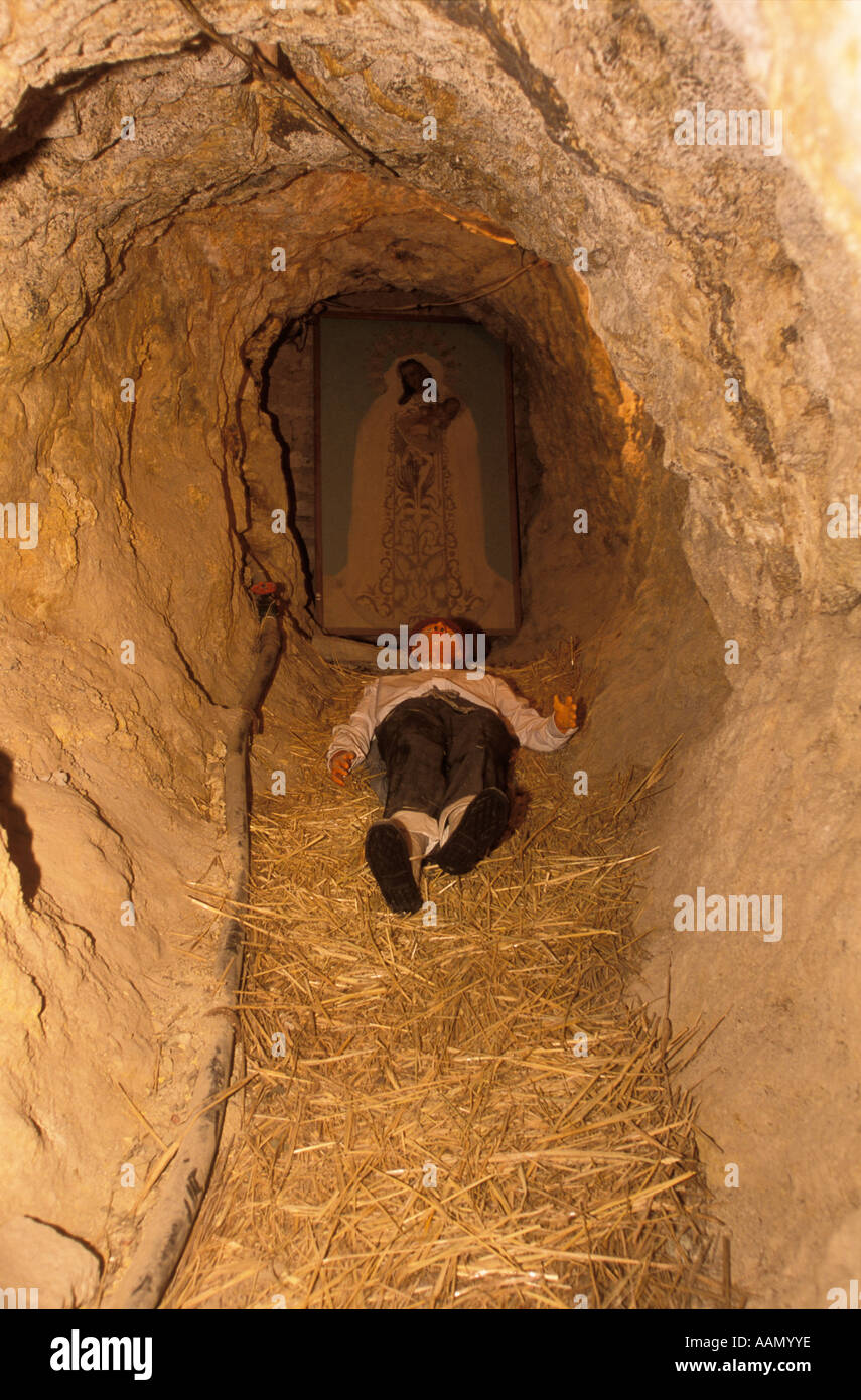 A figure of the bandit Chiru Chiru lies dying from a wound in a ...