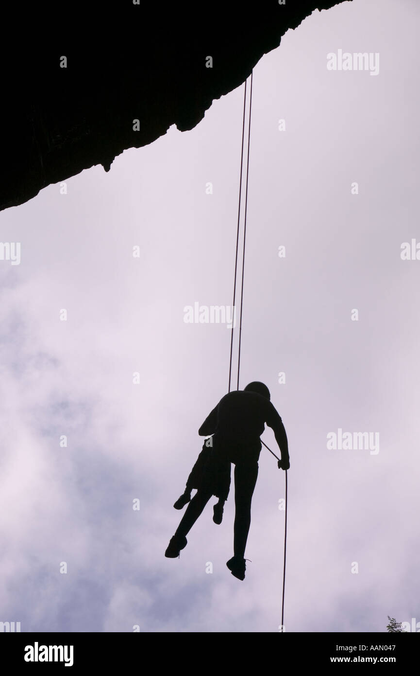 Man abseiling with child Cathedral Quarries Lake district Stock Photo ...