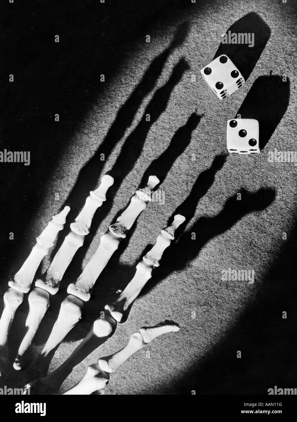 Dice in hand Black and White Stock Photos & Images - Alamy