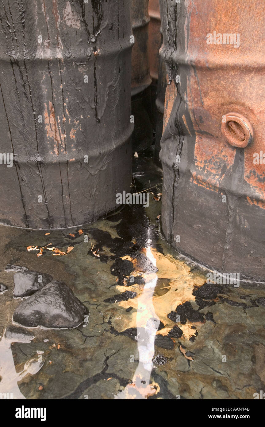 waste oil leaking from rusting oil barrels nome alaska Stock Photo - Alamy