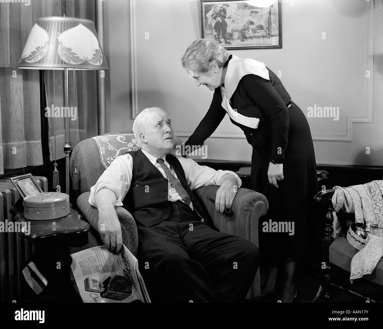 1940s MAN WOMAN SITTING TALKING Stock Photo - Alamy
