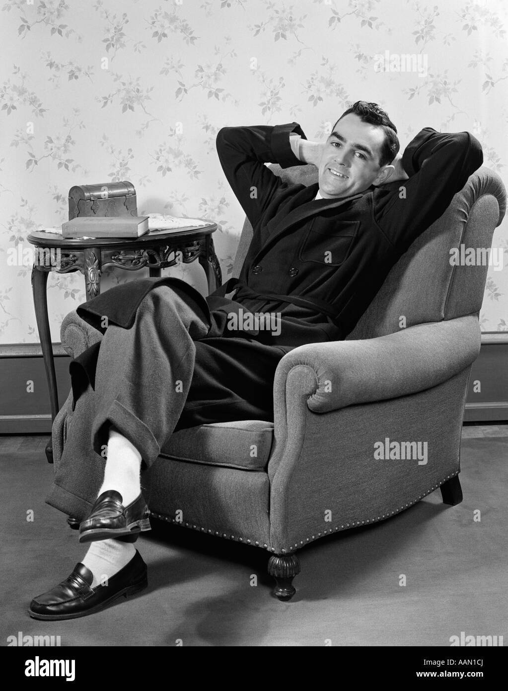 Old man relaxing sitting Black and White Stock Photos & Images - Alamy