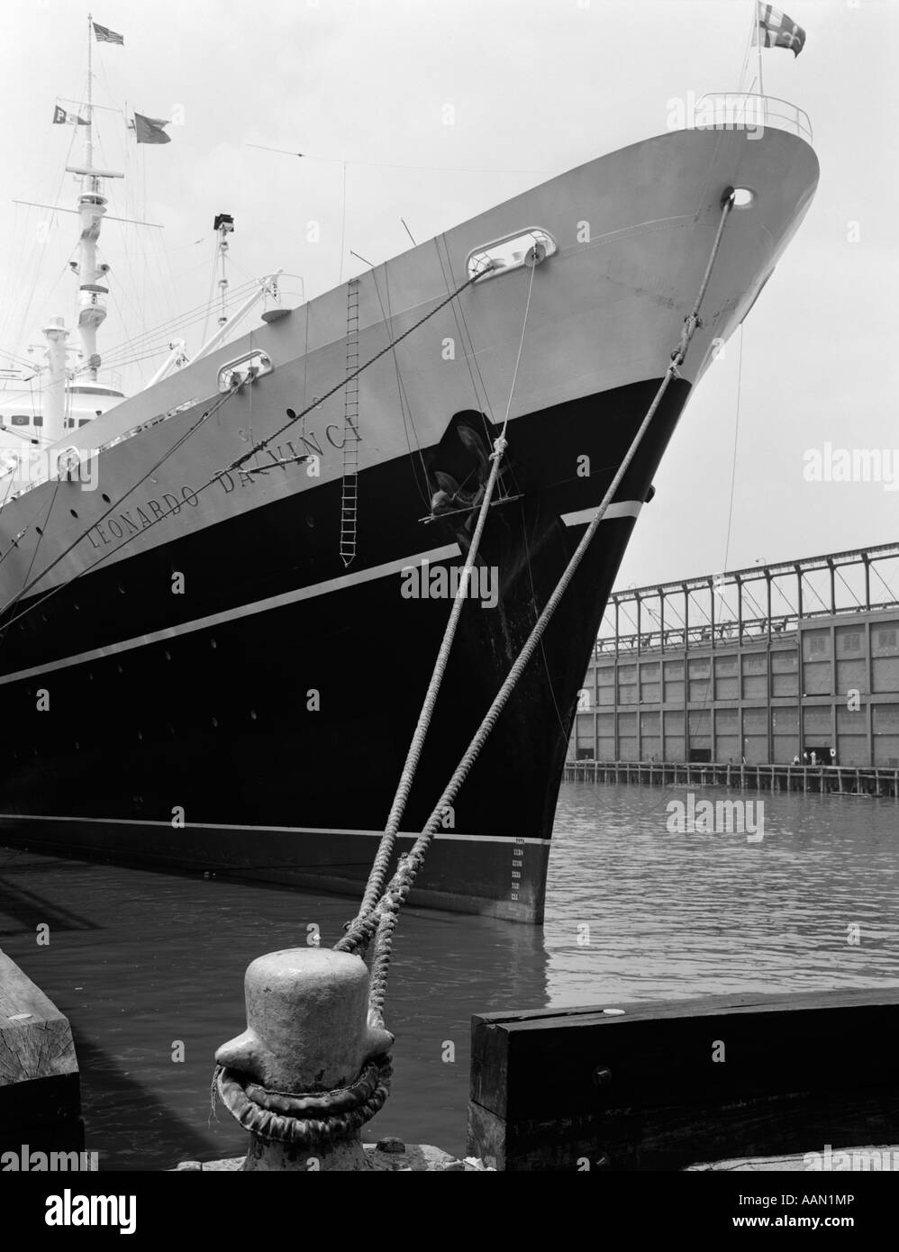 1960s BOW OF LEONARDO DA VINCI SHIP TIED DOWN TO DOCK WITH MAN ...