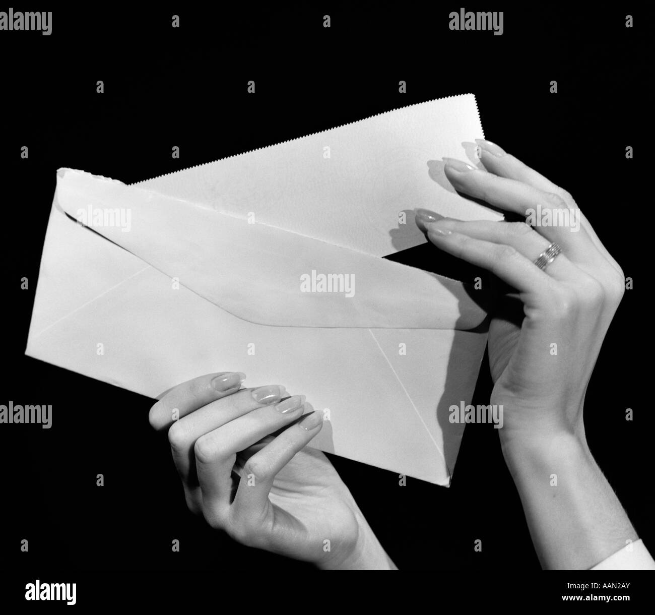 Hand out envelope hands hi-res stock photography and images - Alamy