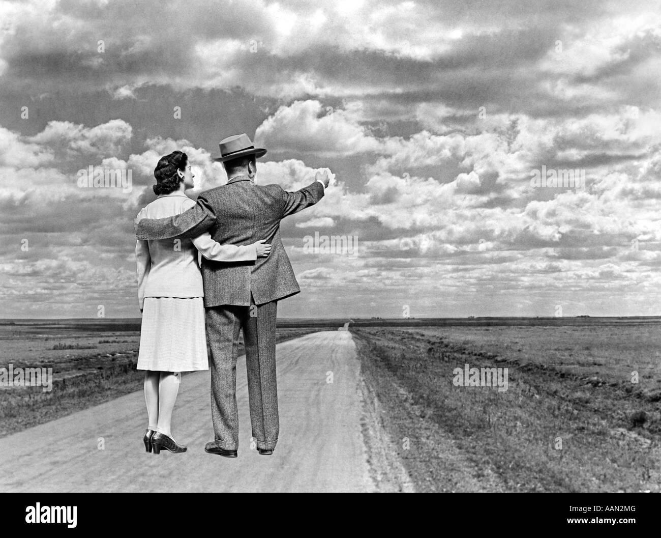 Young man pointing forward Black and White Stock Photos & Images - Alamy