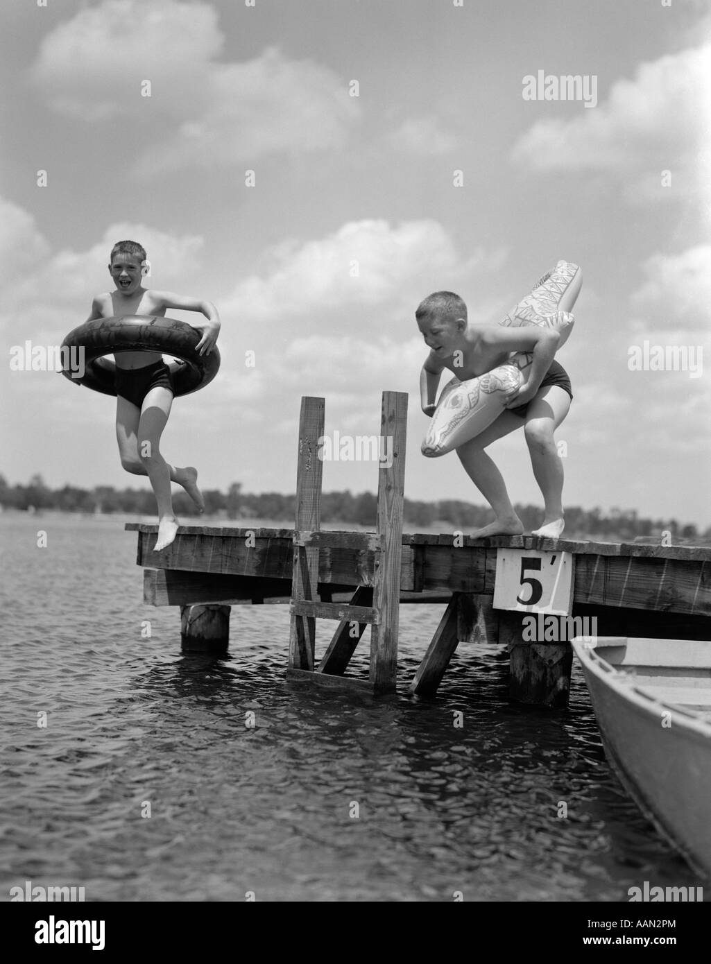 Vintage boys jump hi-res stock photography and images - Alamy