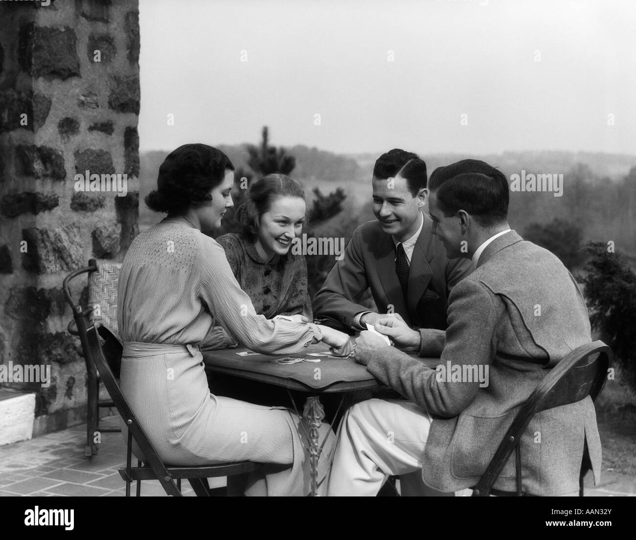 Couples playing card game on hi-res stock photography and images - Alamy
