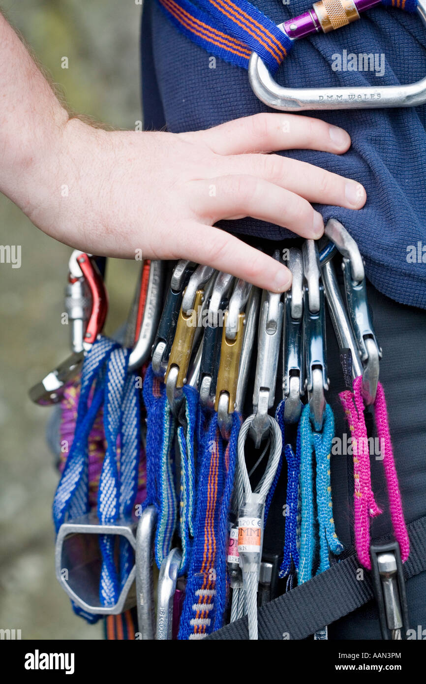 Close up of a belt of climbing equipment worn by a rock climber near ...