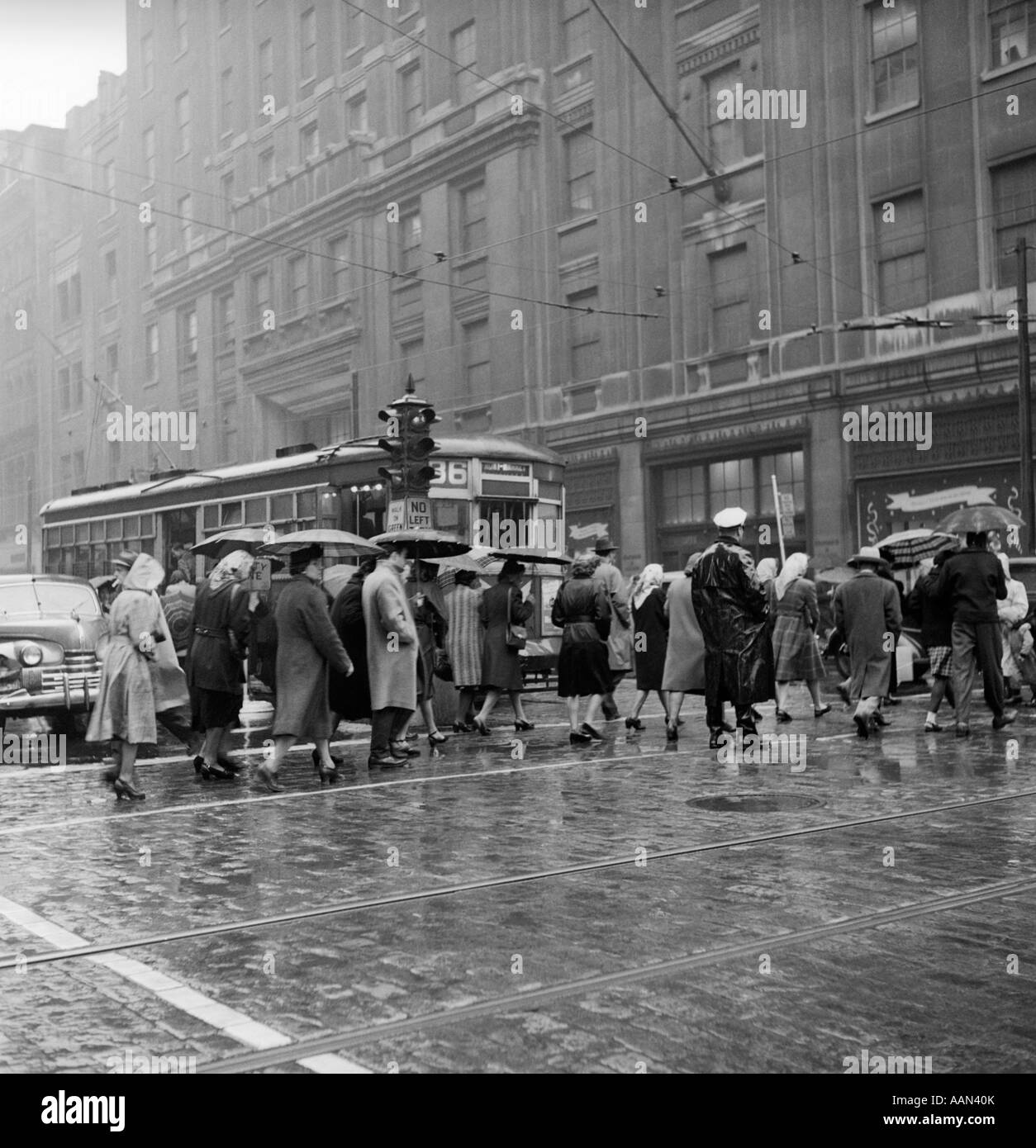 1940s 1950s PEDESTRIAN INTERSECTION CITY CROSS WALK UMBRELLAS RAIN WET ...