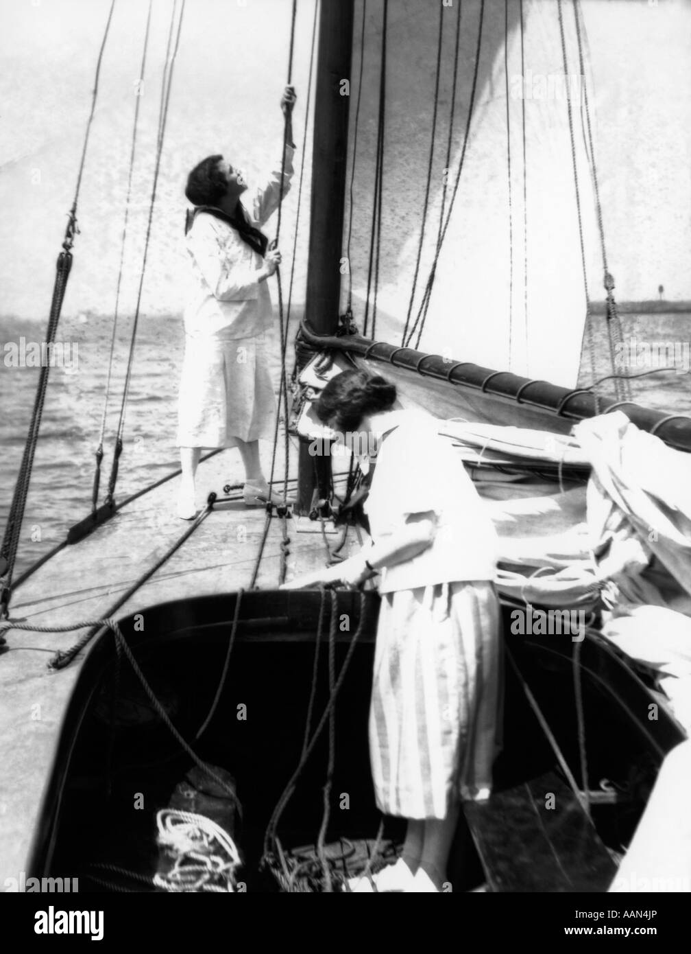 Single boat one sail Black and White Stock Photos & Images - Alamy