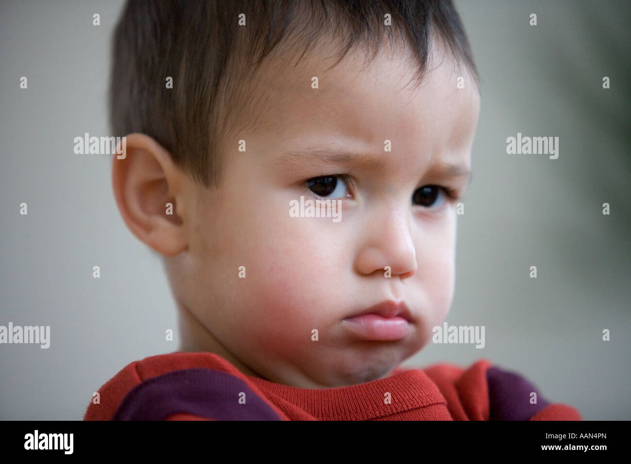 Portrait of a little angry boy Stock Photo - Alamy