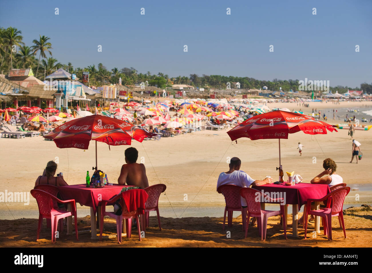 Cafe tables overlooking Baga Beach in Goa Stock Photo - Alamy