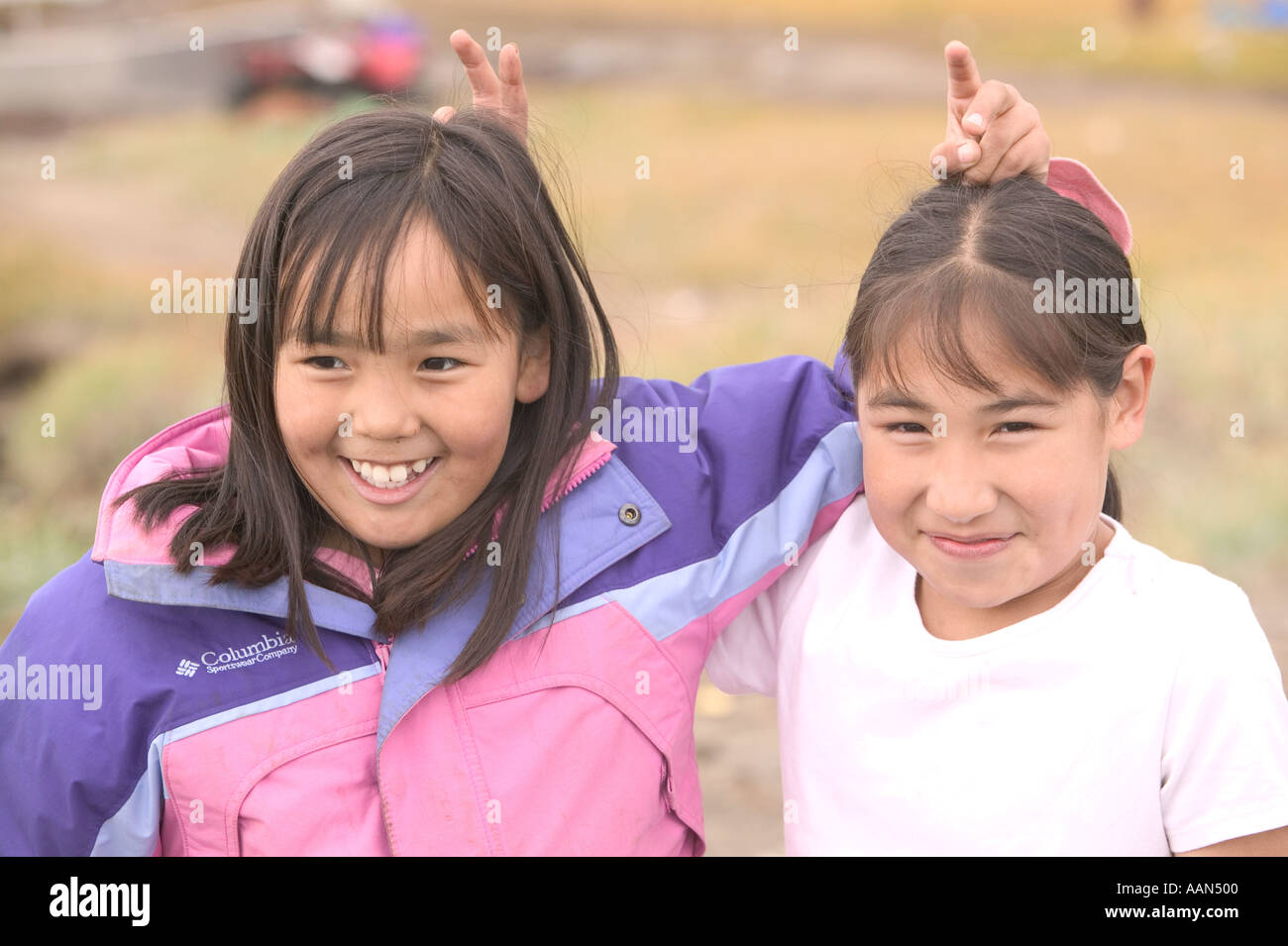 Emma Weyiouanna and friend Eskimo children on the Inuit community of ...