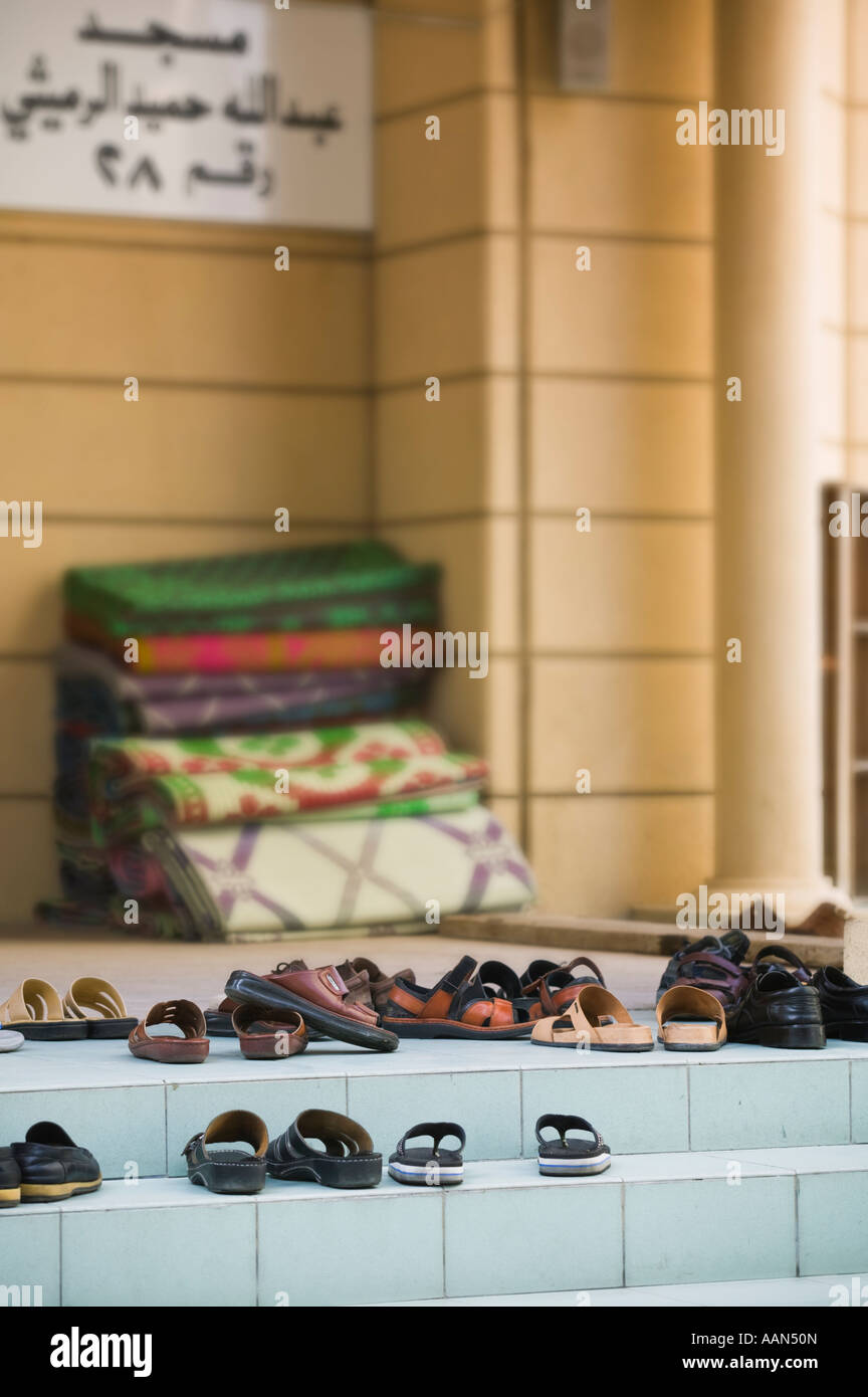 Shoes left at the entrance to a mosque Stock Photo - Alamy