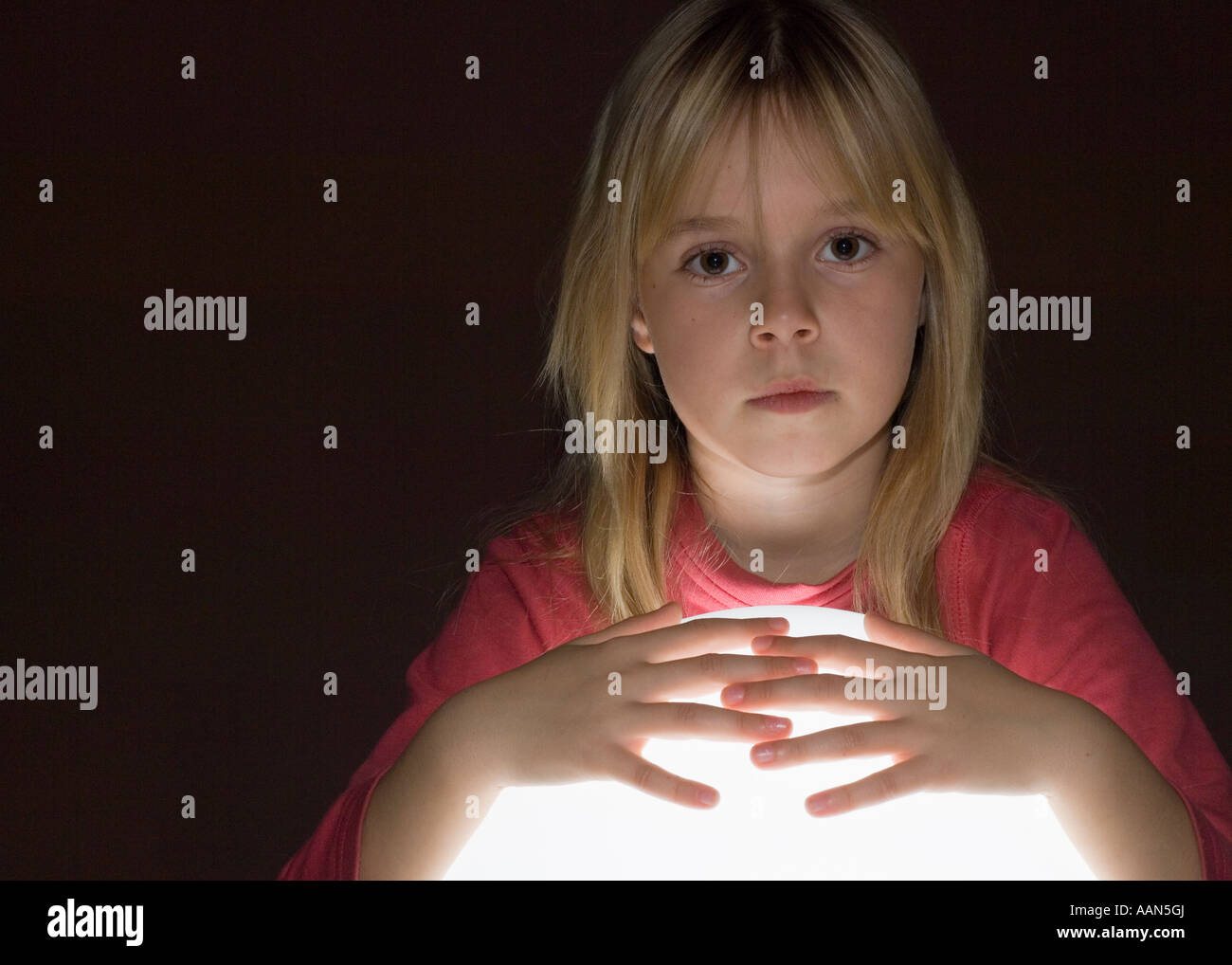 young girl with light ball Stock Photo - Alamy
