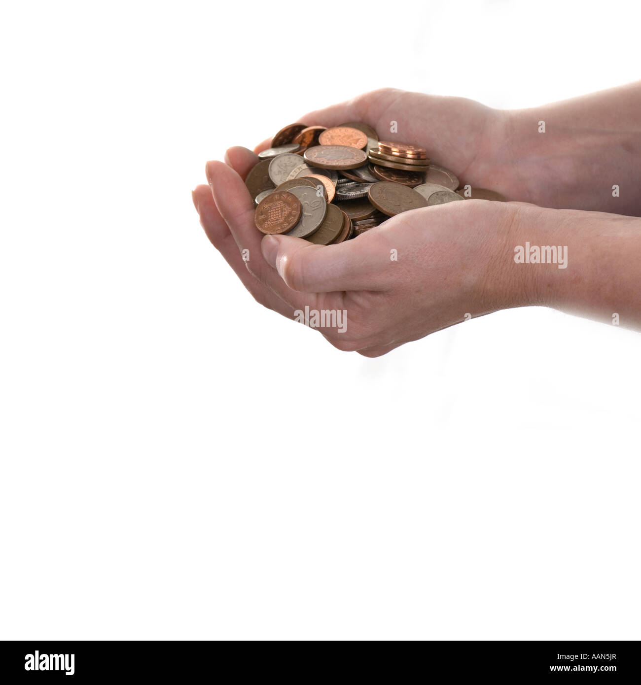 Coins in hands Stock Photo - Alamy