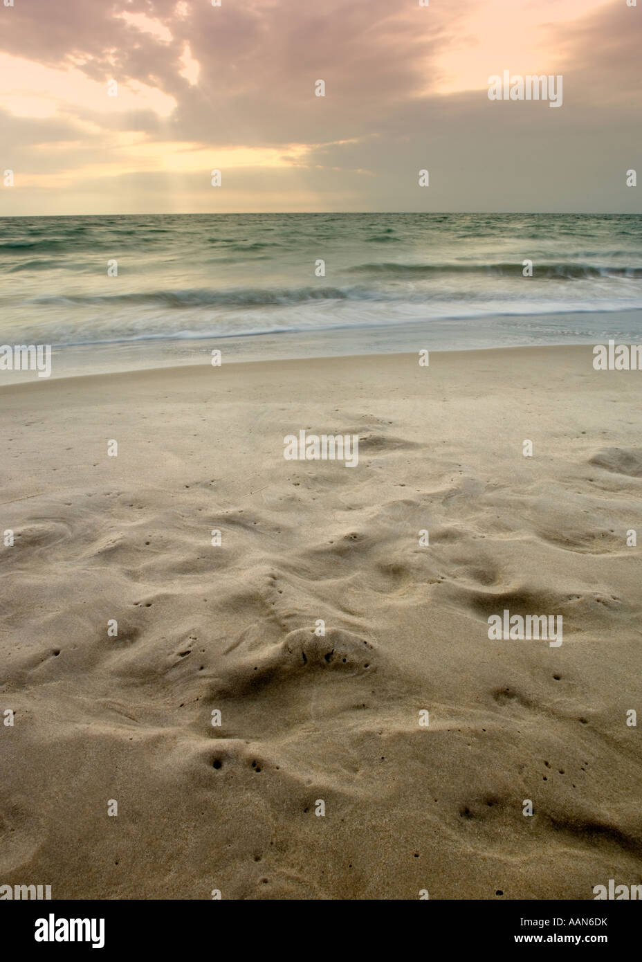 late afternoon in a lonely beach Stock Photo - Alamy