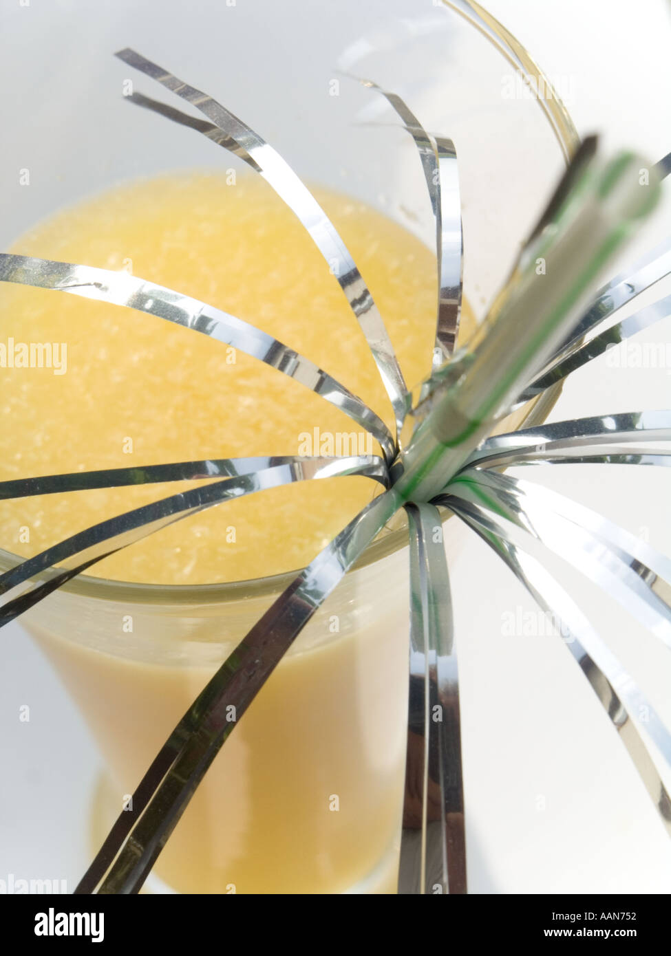 A COCKTAIL WITH A FANCY STRAW Stock Photo - Alamy