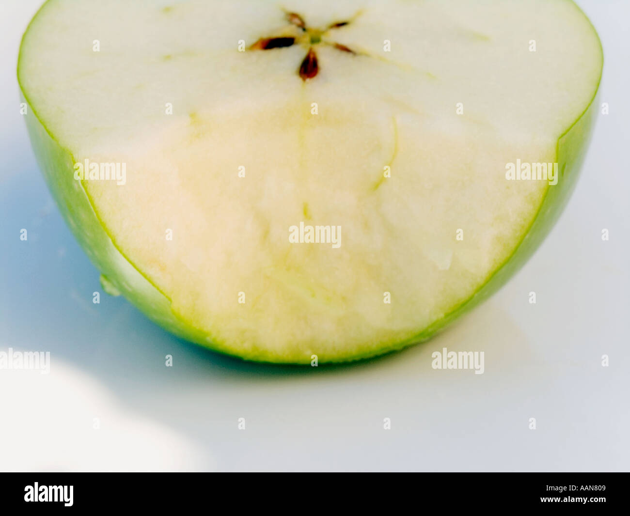 HALF AN APPLE WITH A BITE OUT OF IT Stock Photo - Alamy