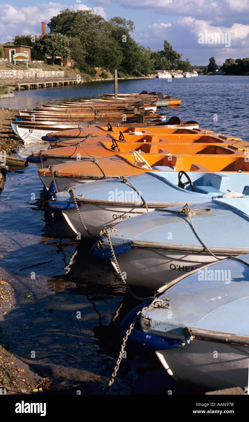 Boats for hire on the river Thames at Hampton Court Palace near London ...