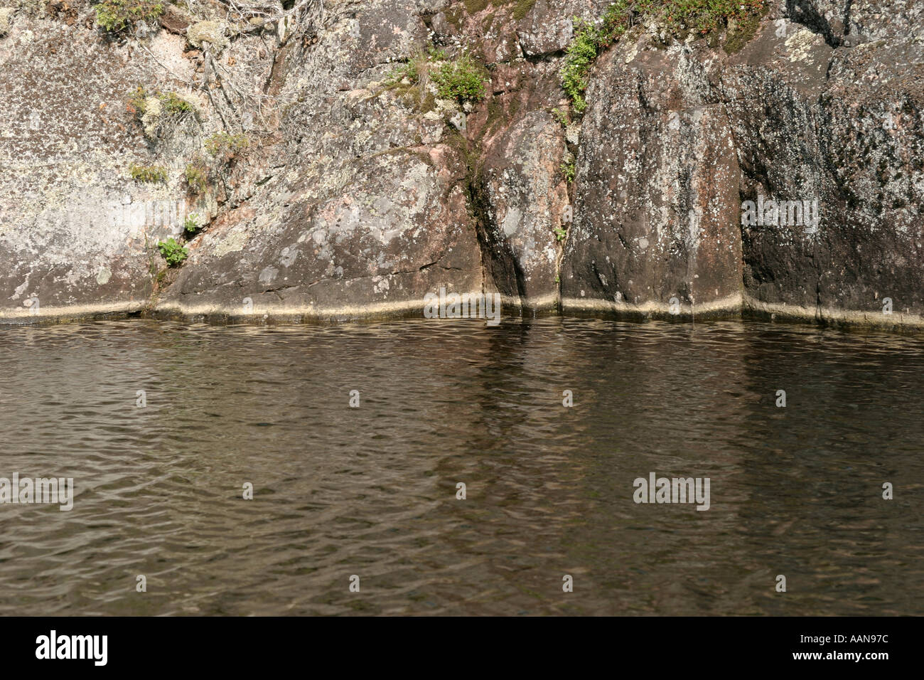 Waterline on Rock Stock Photo - Alamy