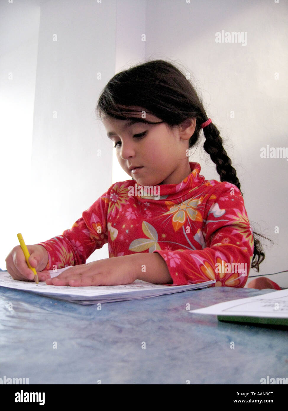 Little girl is writing letters Stock Photo - Alamy