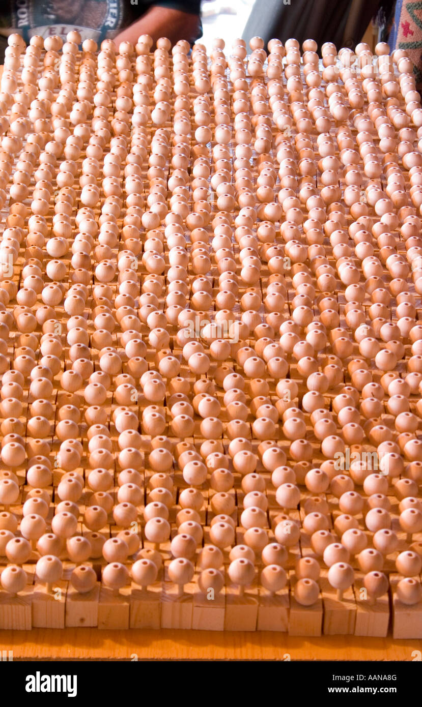 Assembly line production tray of Christmas elf ornaments for hospital ...