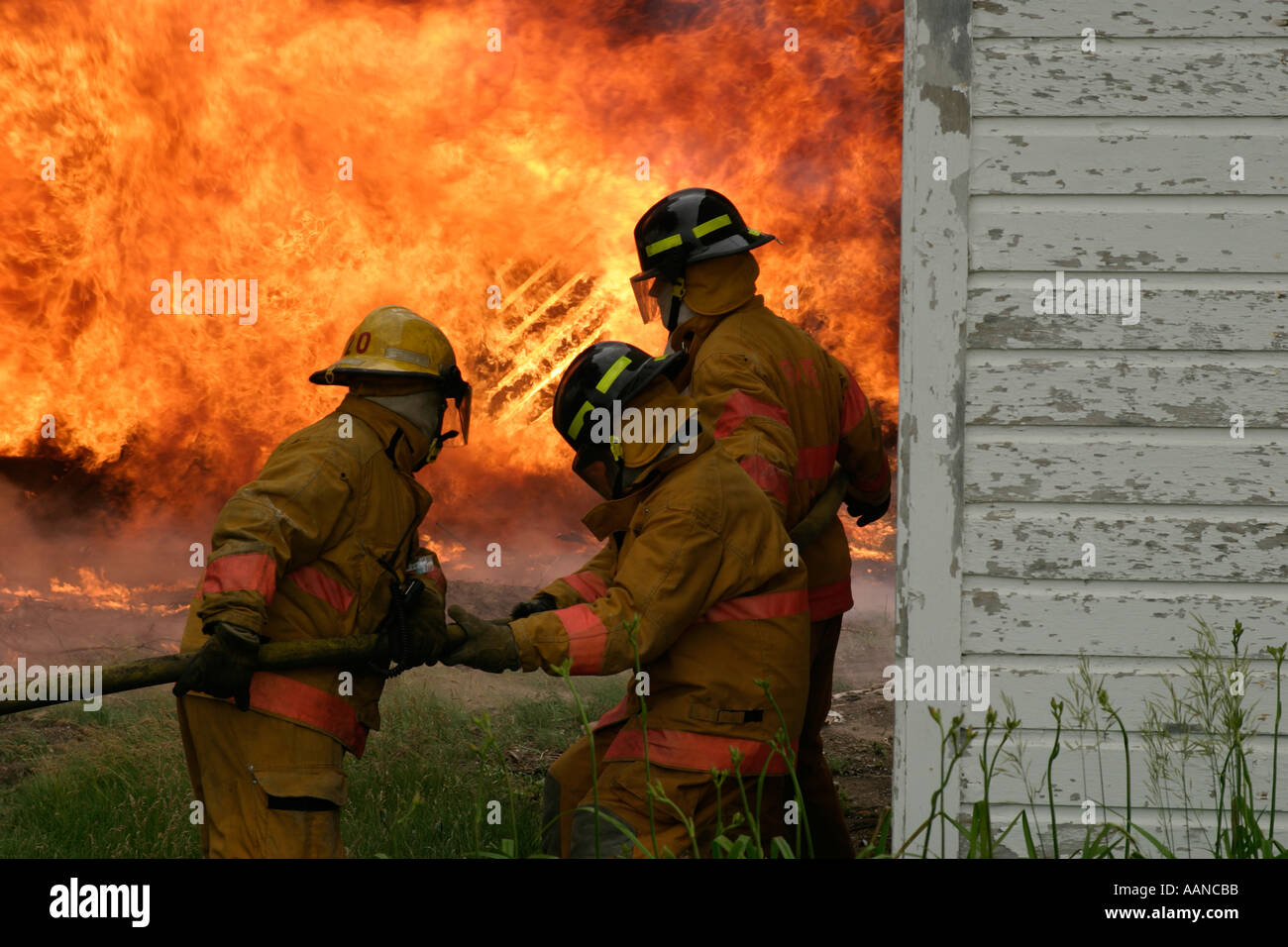 Firefighters extinguish fire smoke fog hi-res stock photography and ...