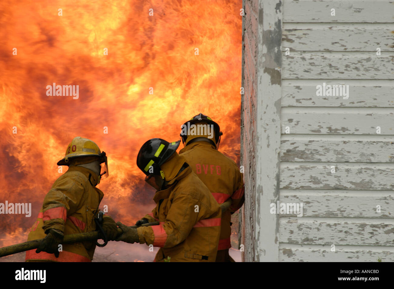 Firefighters Attacking Structure Fire Stock Photo - Alamy