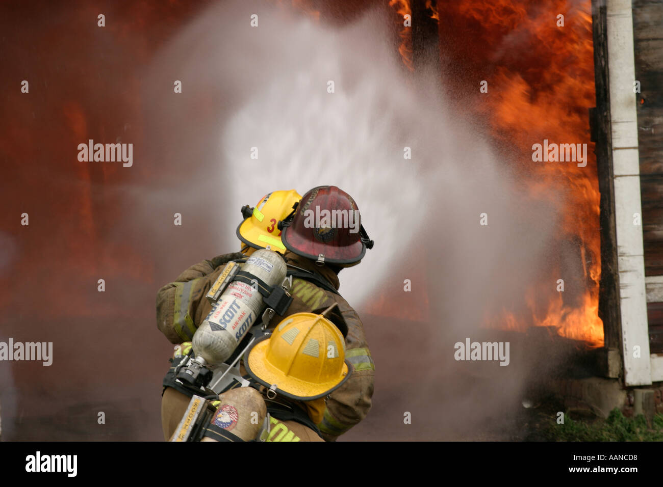 Firefighters Attacking Structure Fire Stock Photo - Alamy