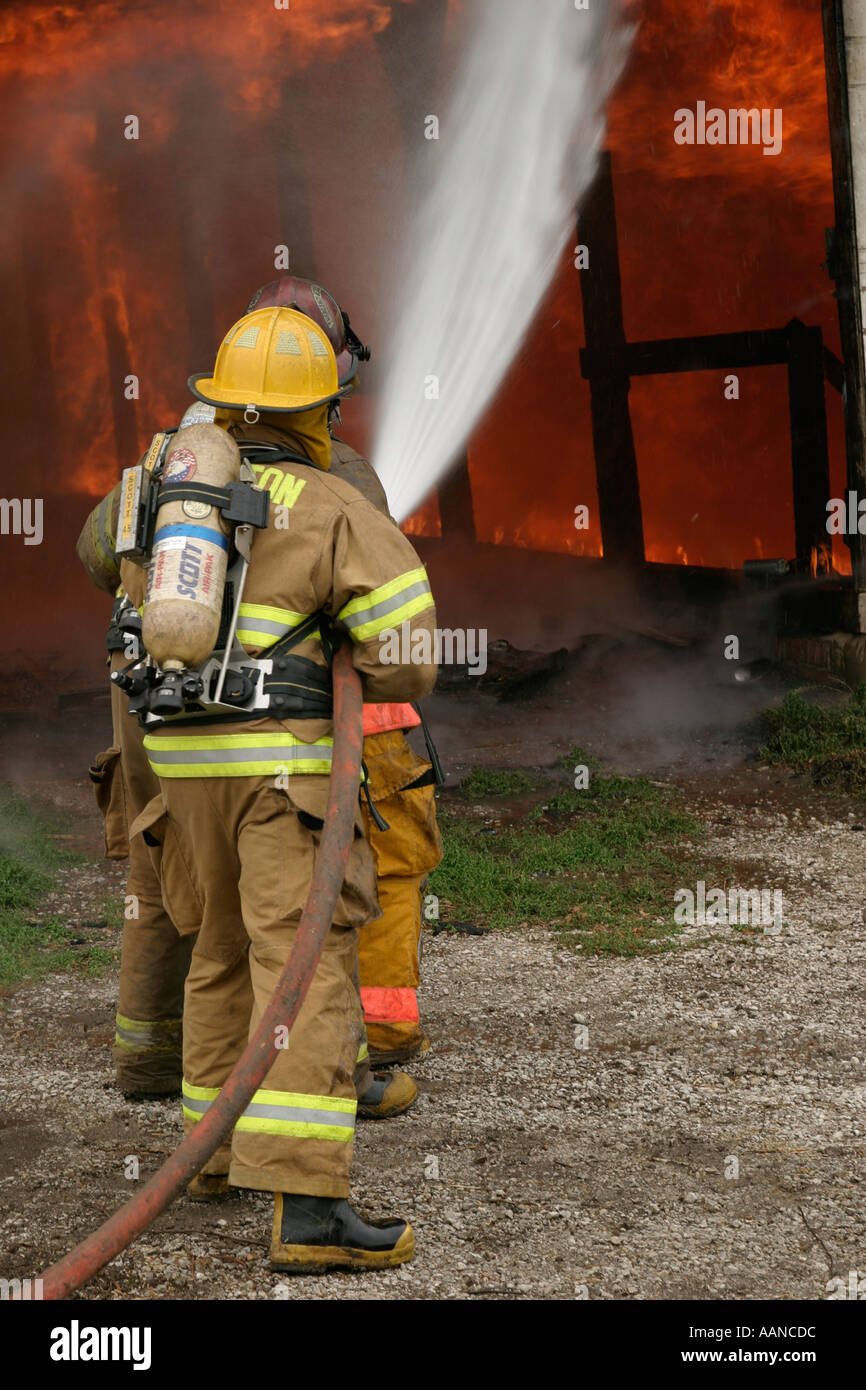 Firefighters Attacking Structure Fire Stock Photo - Alamy