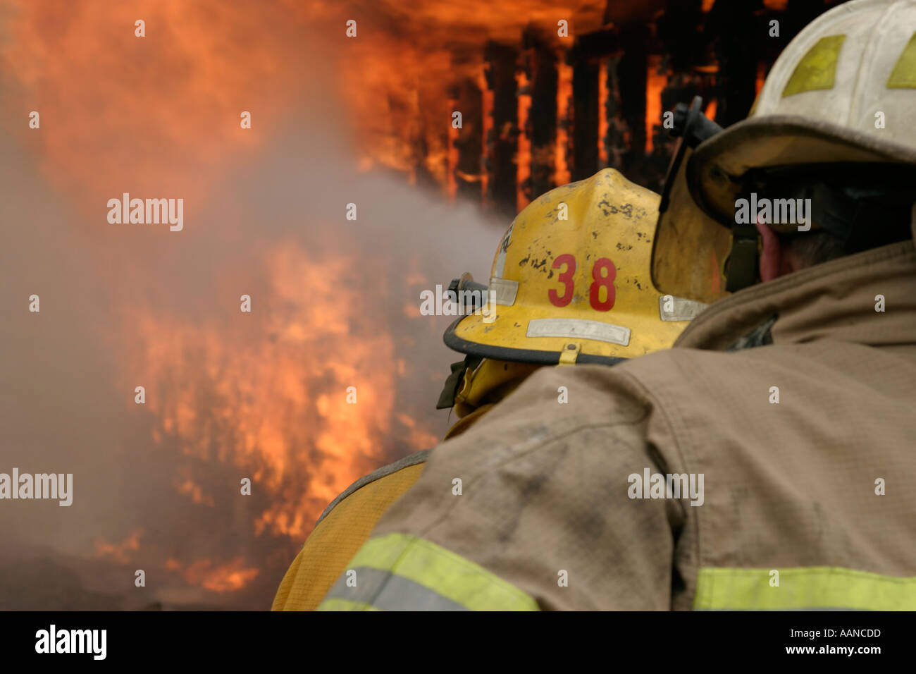 Firefighters Attacking Structure Fire Stock Photo - Alamy