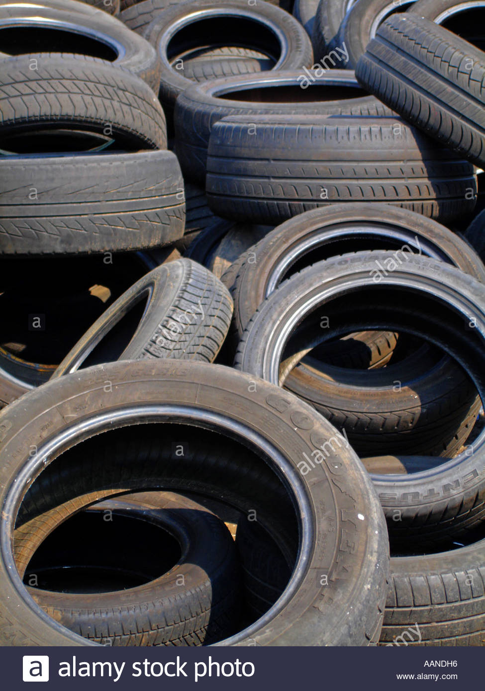A pile of old worn out car tyres Stock Photo - Alamy