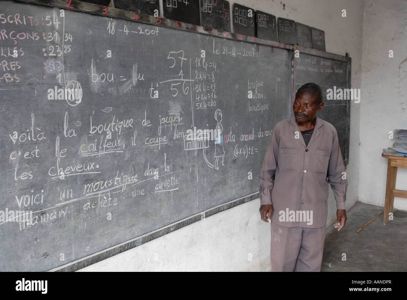 A teacher during French language lecture in a classroom in North Kivu ...
