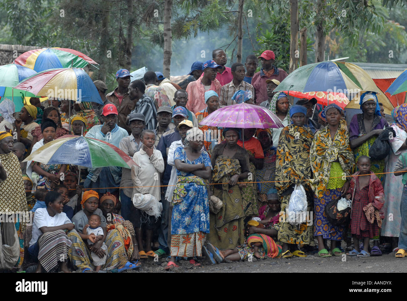 Displaced Congolese women wait for food distribution carried out by the ...