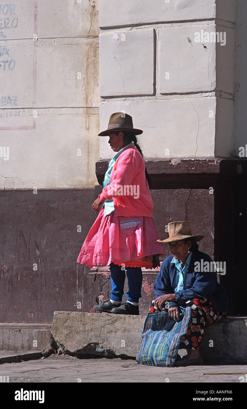 Peruvian women in colourful Andean costume outside church in Carhuaz ...