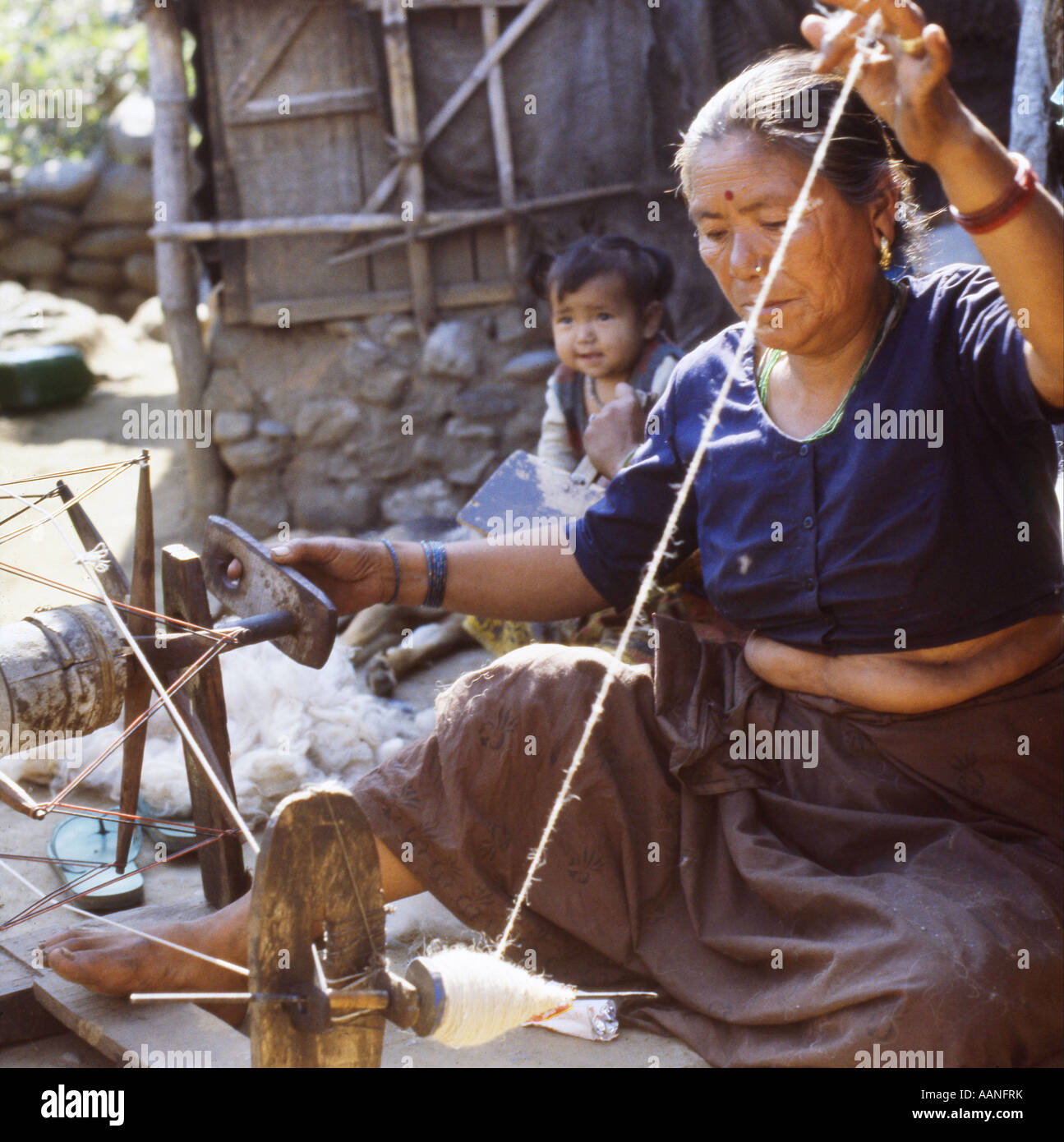 Wool spinning nepal hi-res stock photography and images - Alamy
