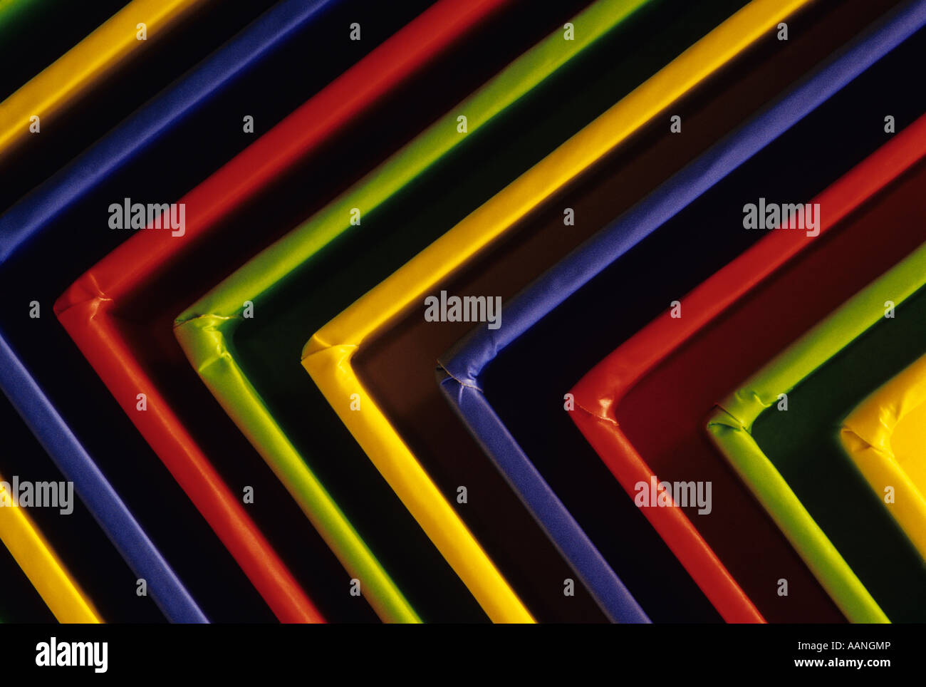 Colorful boxes laid out and evenly spaced creating a colorful pattern ...