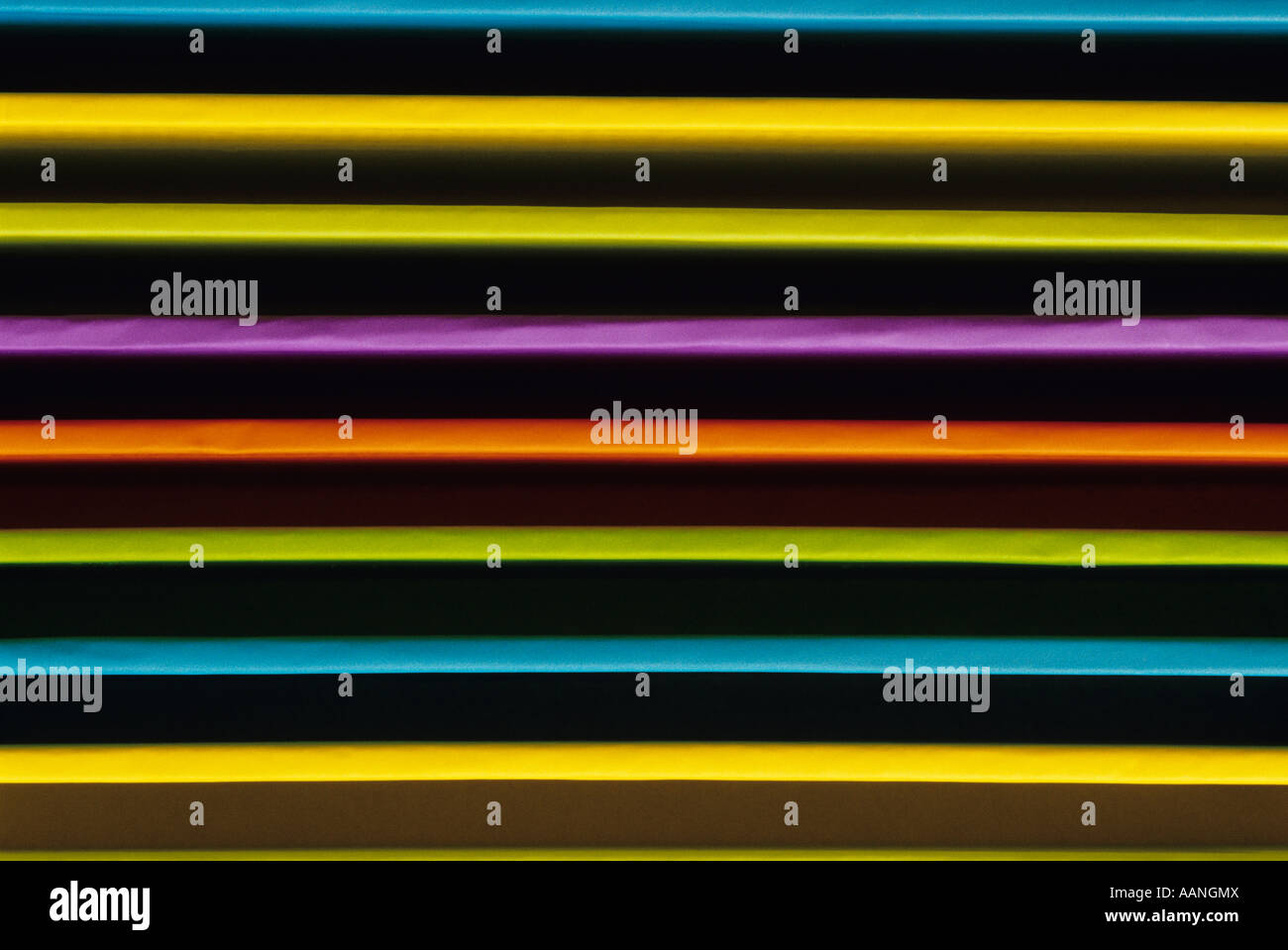 Colorful boxes laid out and evenly spaced creating a colorful pattern ...