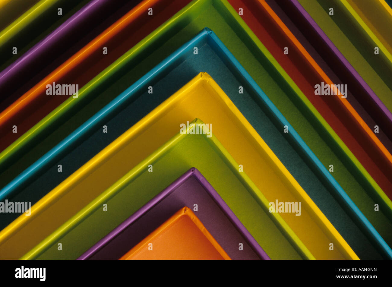 Colorful boxes laid out and evenly spaced creating a colorful pattern ...