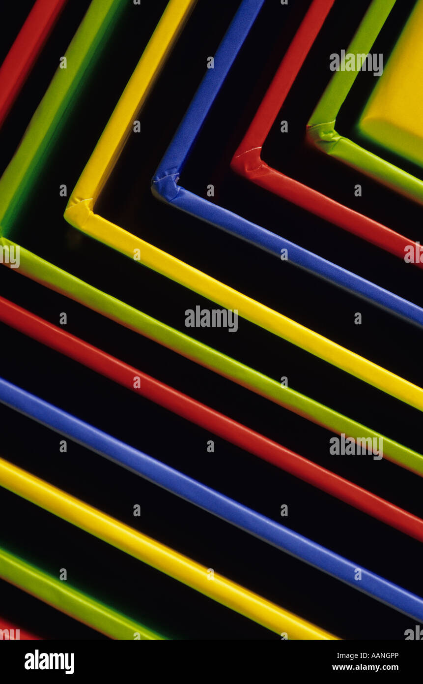 Colorful boxes laid out and evenly spaced creating a colorful pattern ...