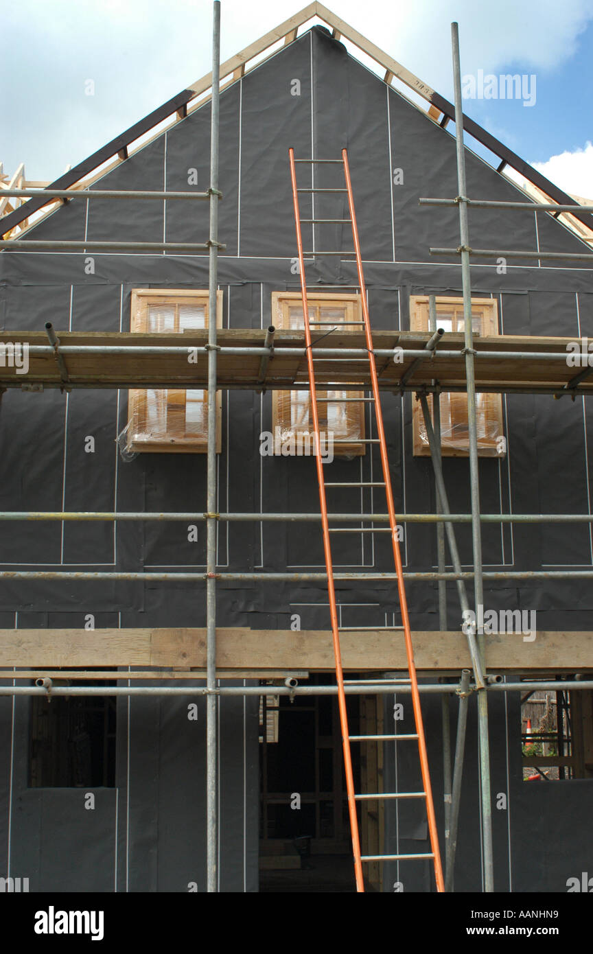 ladder against building site Stock Photo - Alamy