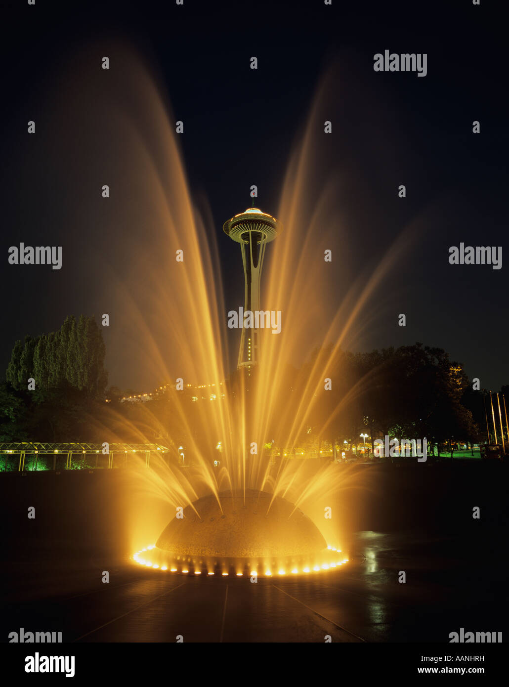 Downtown Seattle with Seattle Center with beautiful fountain at night ...