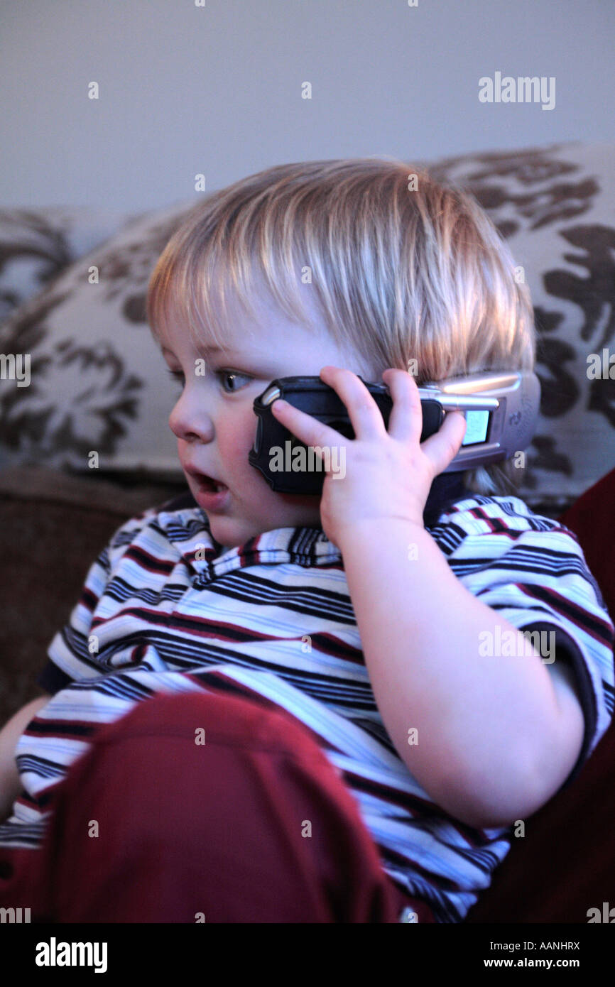 toddler using mobile phone Stock Photo - Alamy
