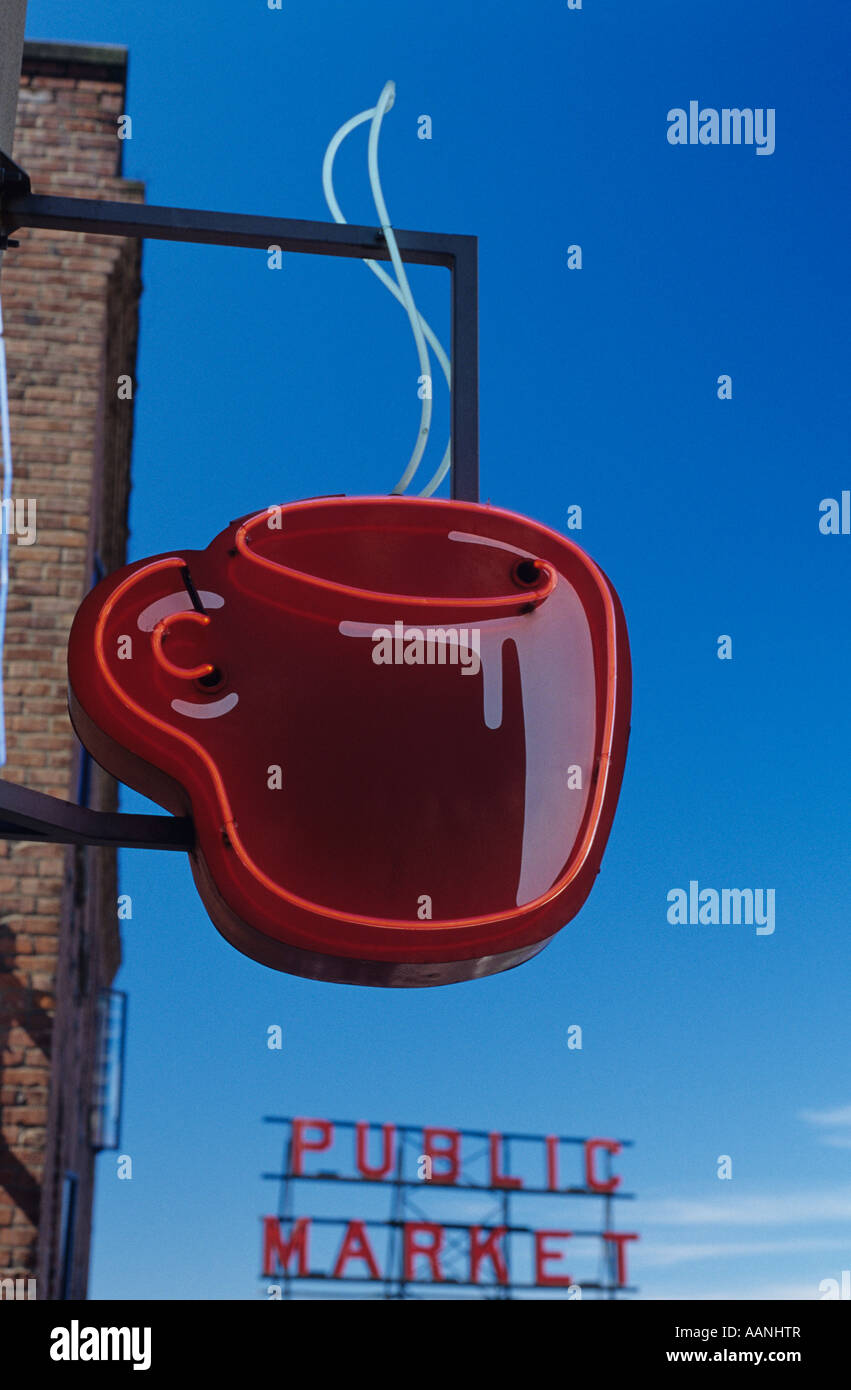 Neon coffee mug sign with Pike Place Market sign in background with ...