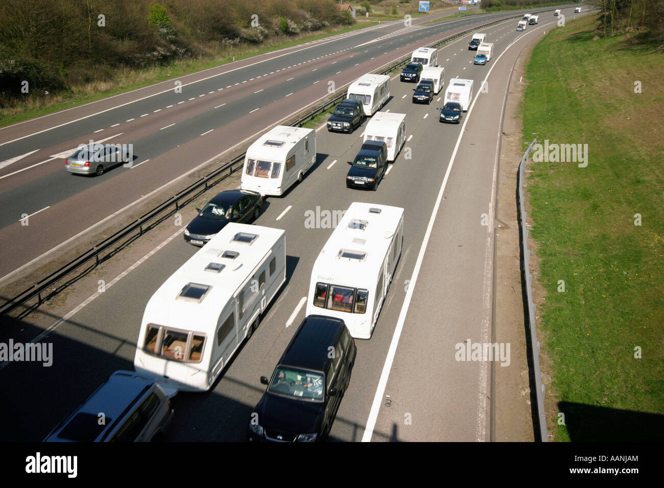 Cars towing caravans hi-res stock photography and images - Alamy