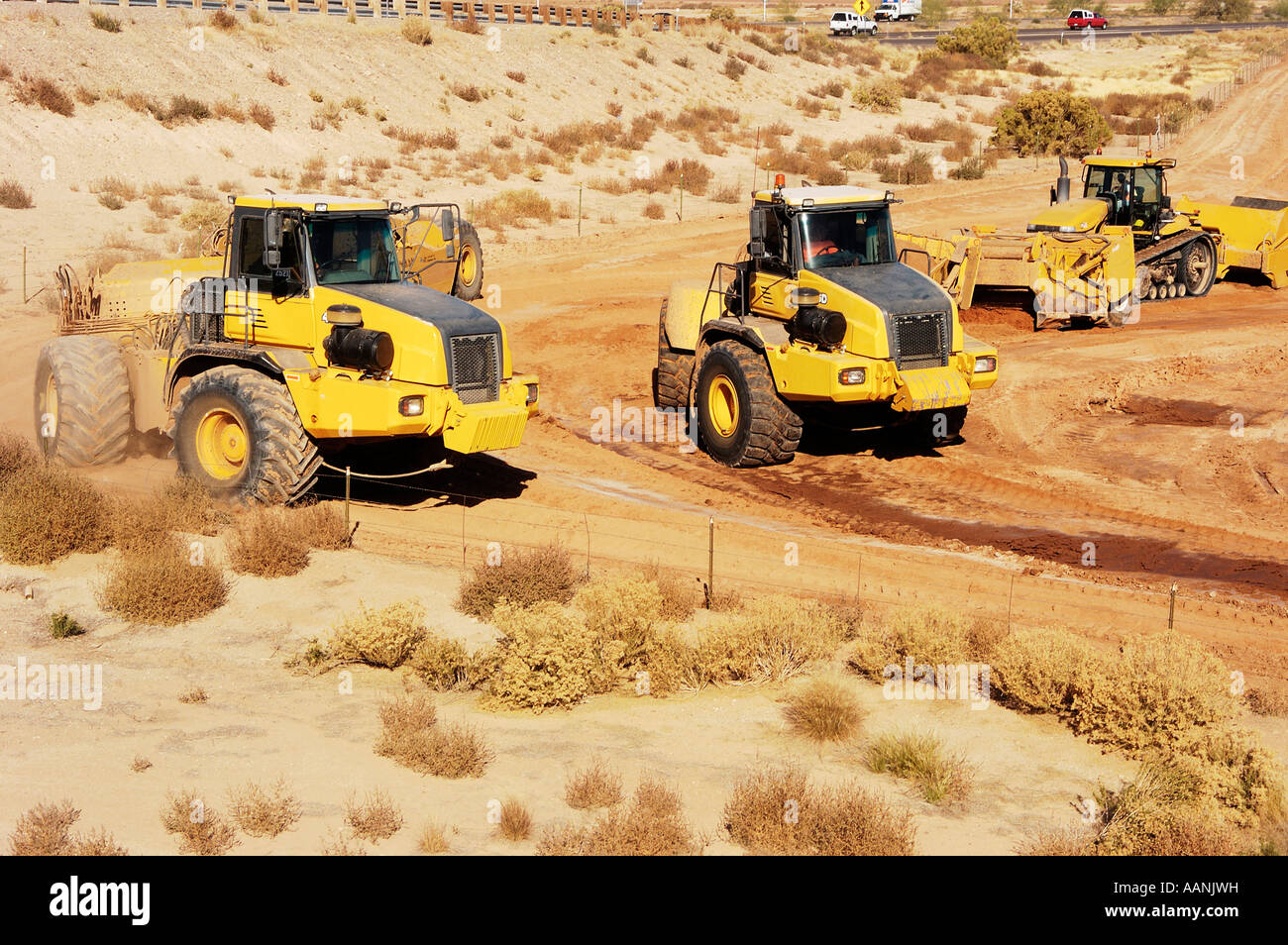 earthmoving equipment at work preparing a construction site for ...