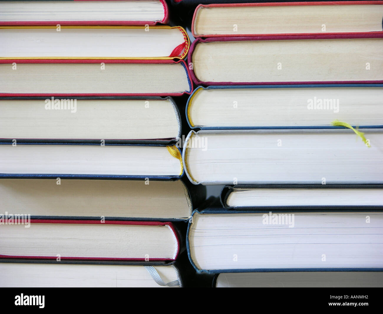 Two piles of books Stock Photo - Alamy